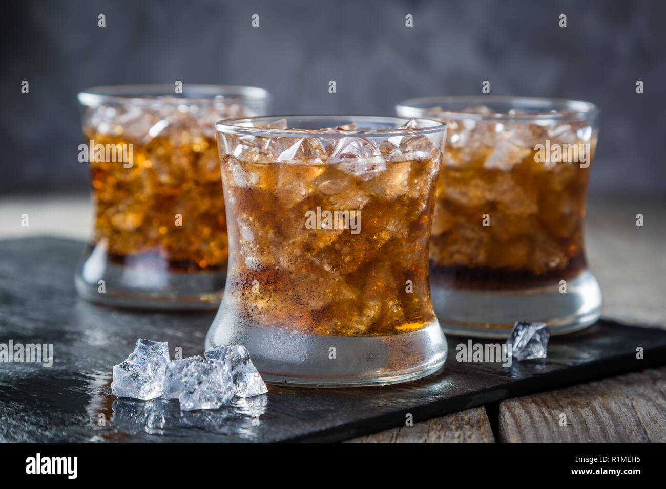 Rum and cola cocktail in glasses Stock Photo - Alamy