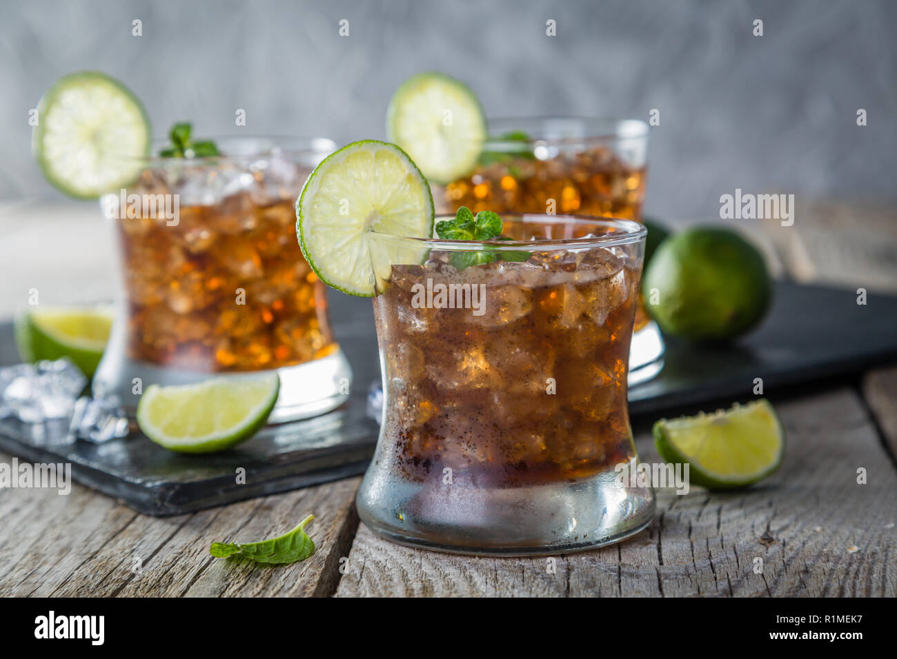 Rum and cola cocktail in glasses Stock Photo - Alamy