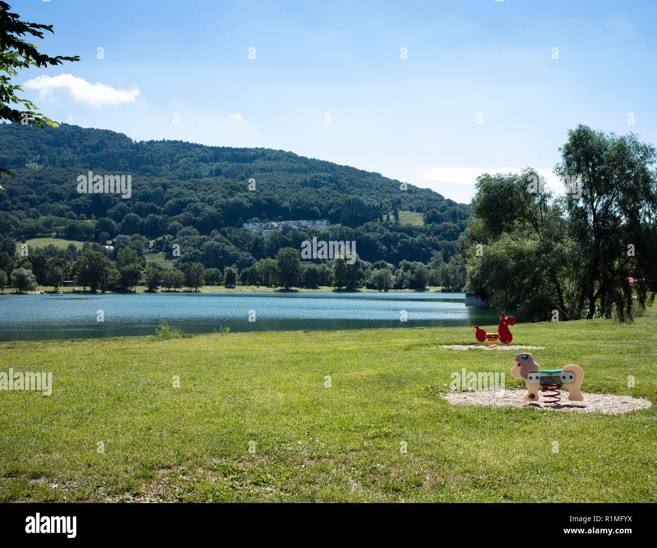 Playground with rocking horse hi-res stock photography and images - Alamy