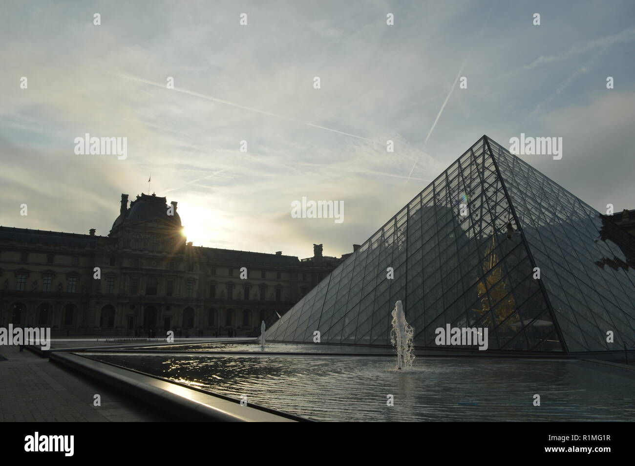 Louvre sunrise hi-res stock photography and images - Alamy