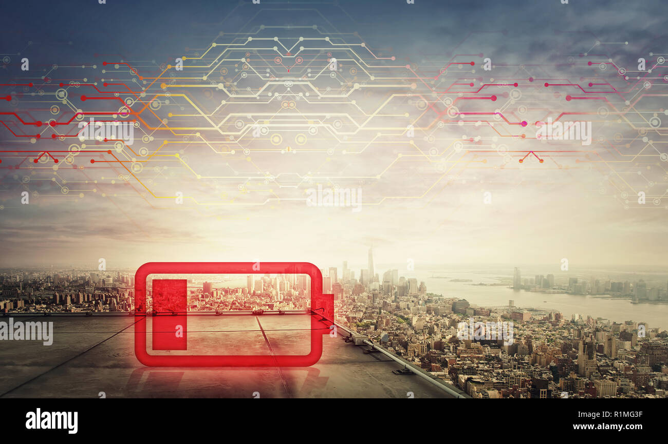 Red low power battery symbol hologram on the rooftop of a skyscraper ...