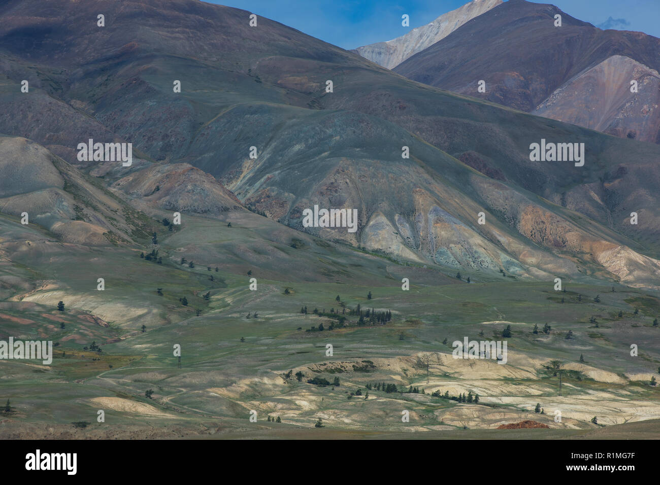 Different colored mountains Stock Photo - Alamy