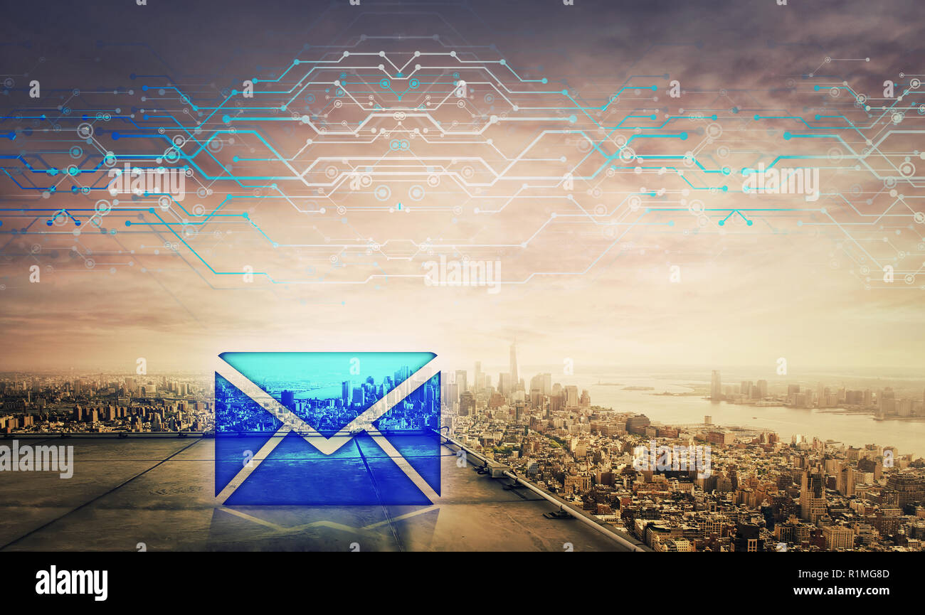 Blue message icon hologram on the rooftop of a skyscraper over the big ...