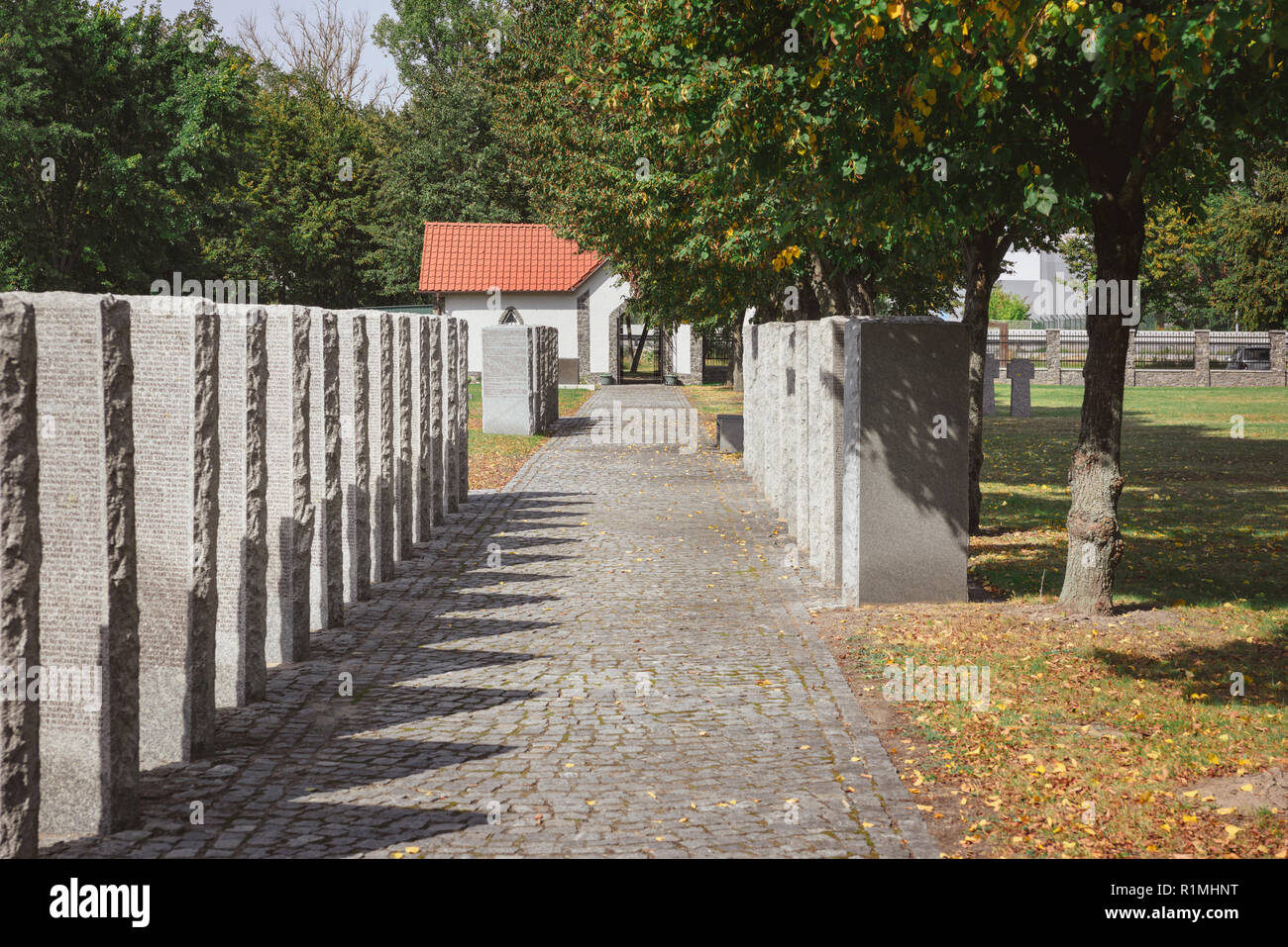 cemetery with memorial gravestones placed in rows under tree Stock ...