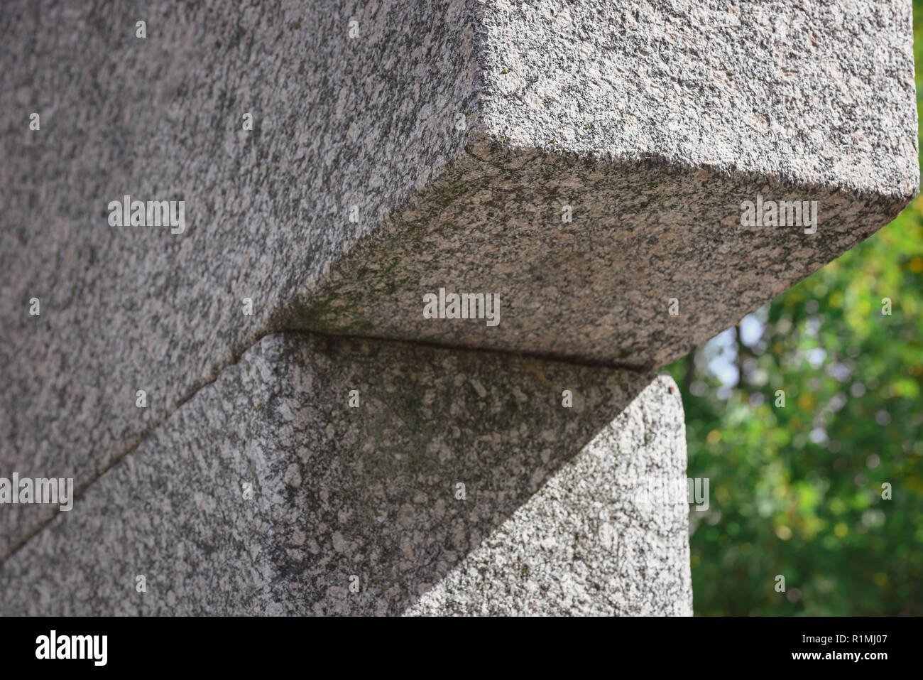 partial view of memorial tombstone in shape of cross at graveyard Stock ...