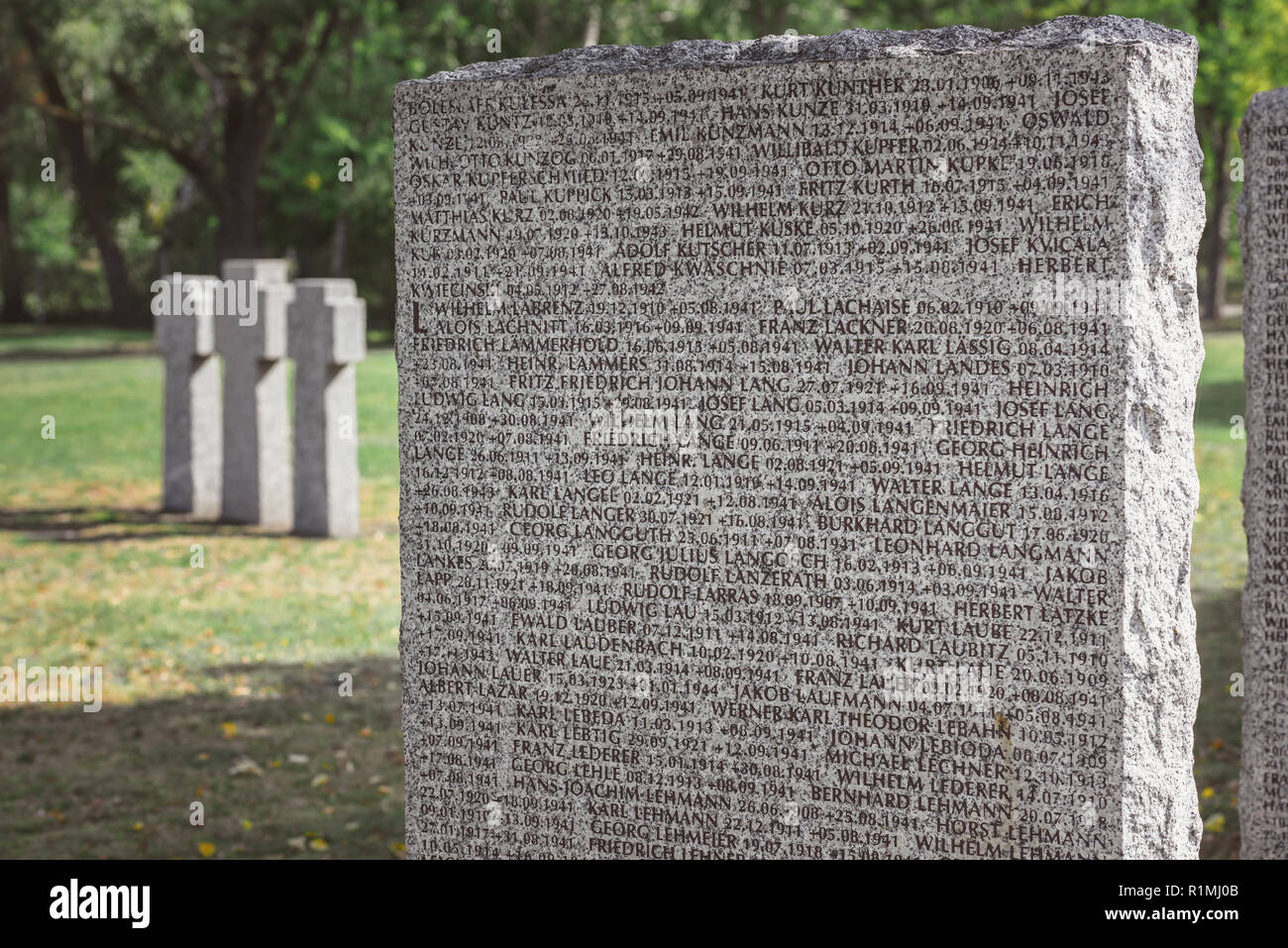 close up view of memorial tombstone with lettering at graveyard Stock ...