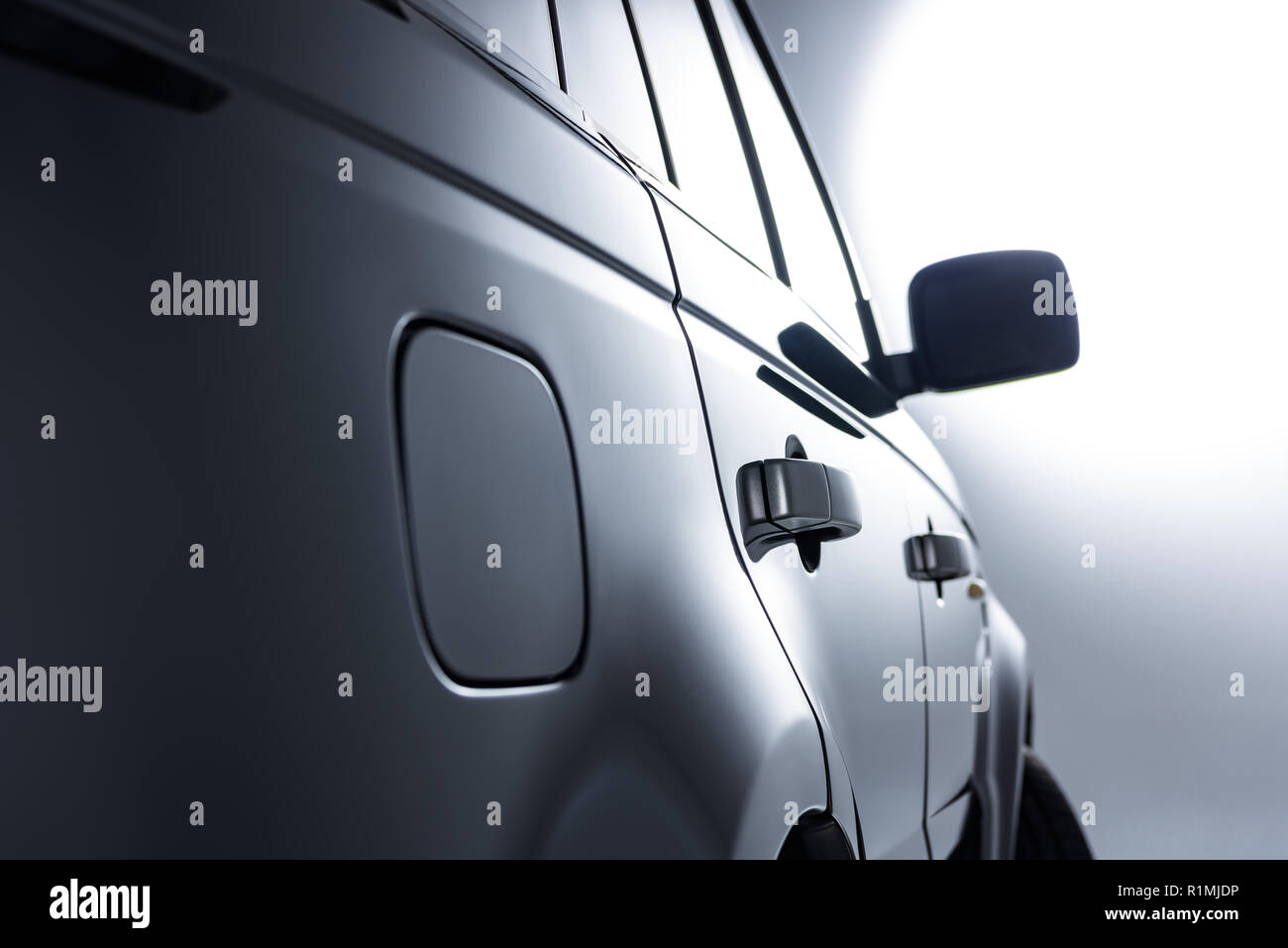close up view of black luxury car on grey backdrop Stock Photo - Alamy