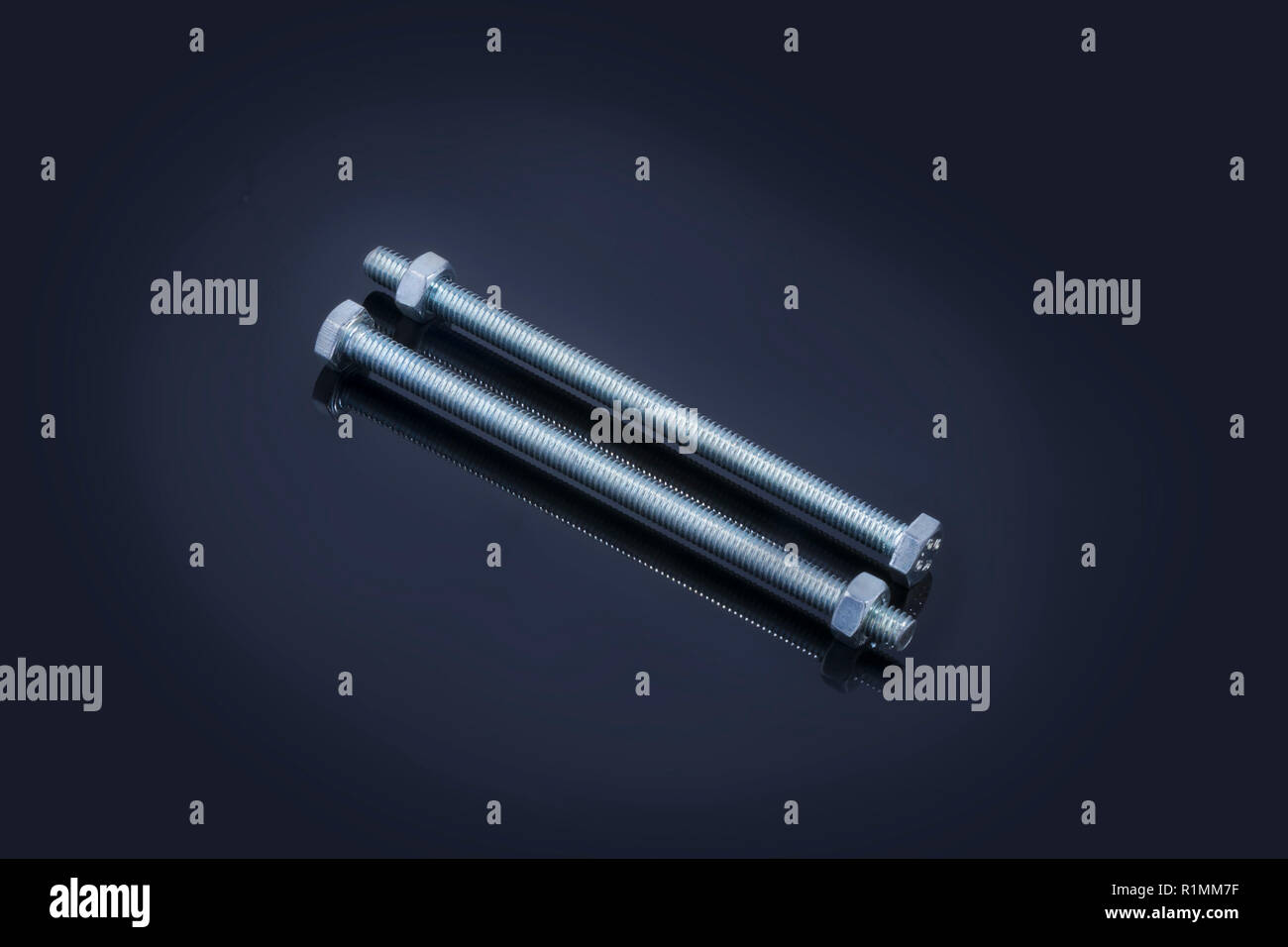 Metal bolt and close-up with reflection and bright texture isolated on ...