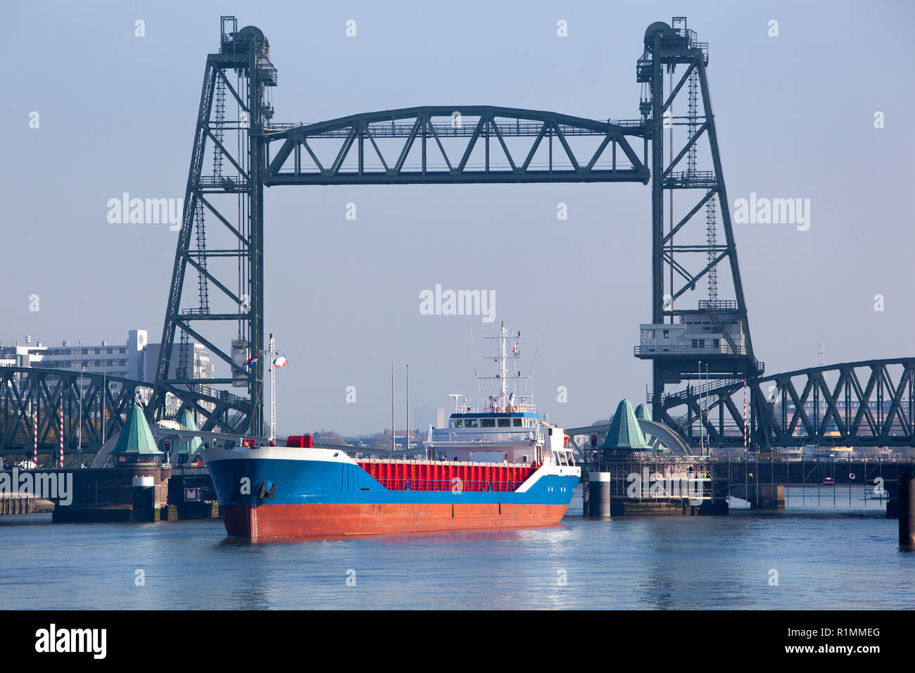 Monument and old railway bridge de Hef and ship in Rotterdam in the ...