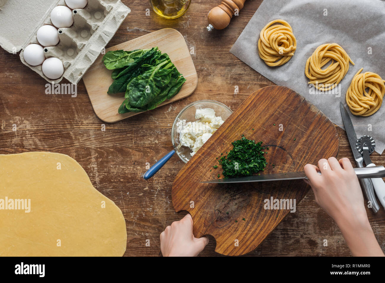 Female chopping food ingredients hi-res stock photography and images ...