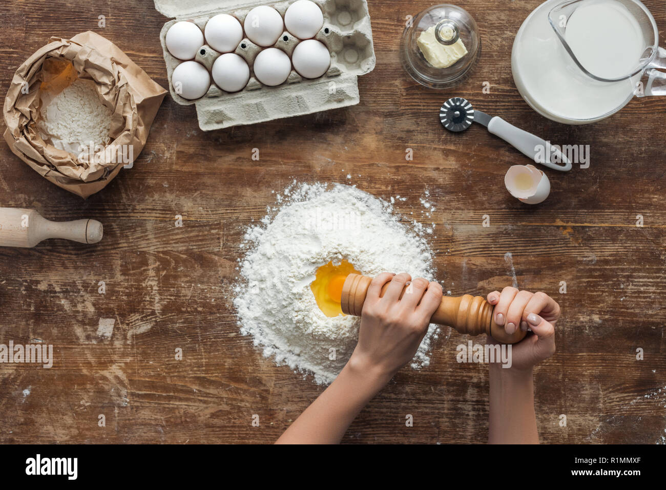 Woman adding salt to food hi-res stock photography and images - Alamy