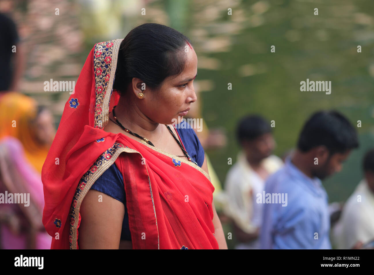 A woman migrant from the Indian state of Bihar celebrating festival ...