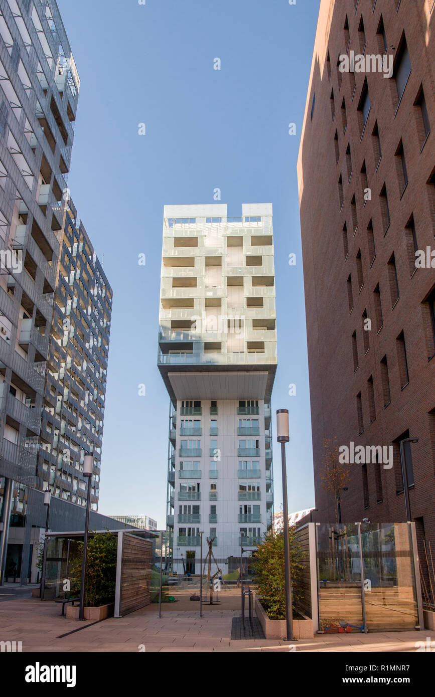 low angle view of contemporary buildings and empty city street at ...