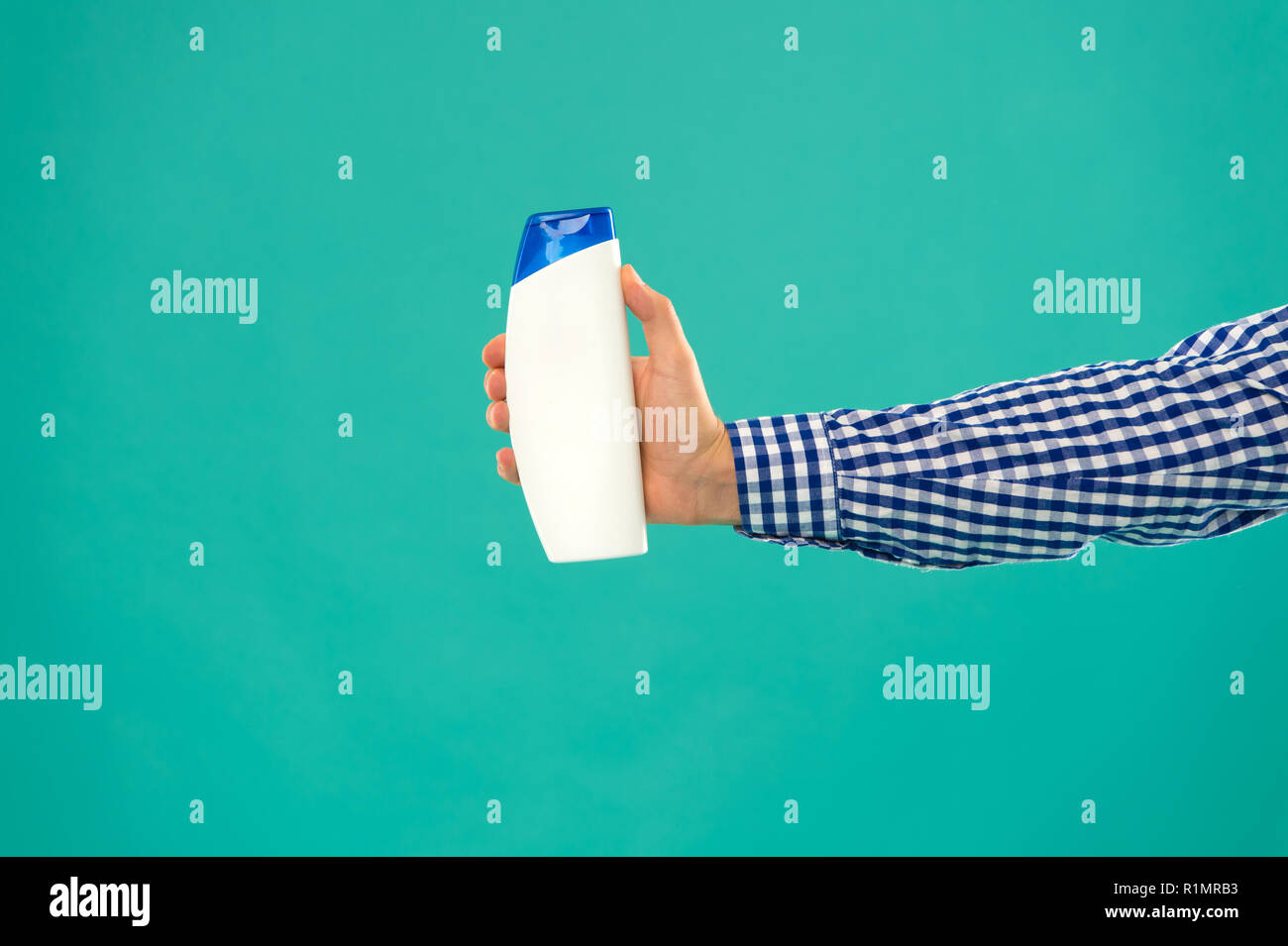 It is time for grooming. Personal care. man holding shampoo. best ...