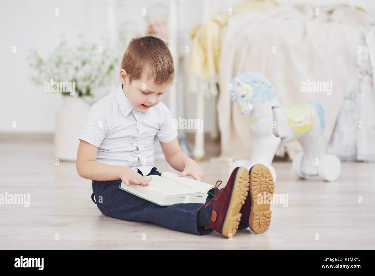 Boy reading a book. Education, Knowledge, getting ready for school ...