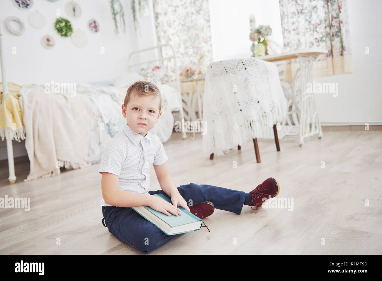 Boy reading a book. Education, Knowledge, getting ready for school ...