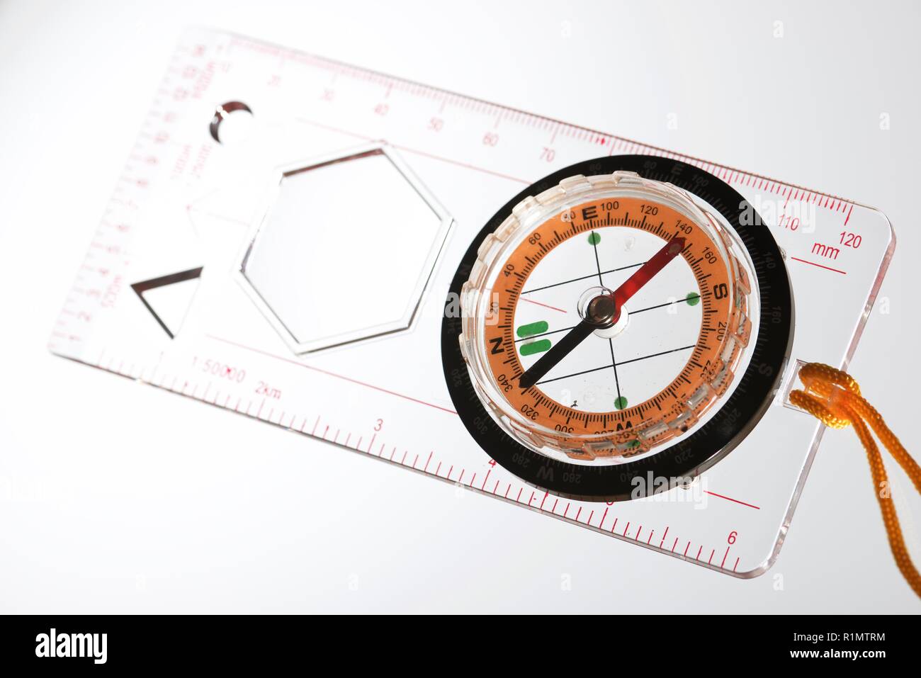 Compass close up and white background Stock Photo - Alamy