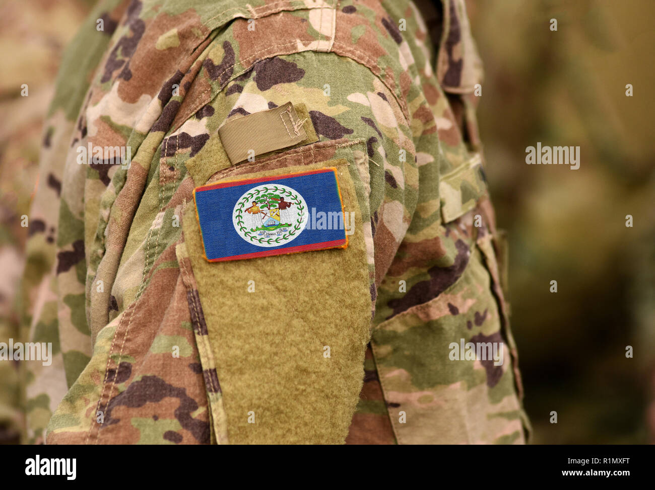 Belize flag on soldiers arm. Belize troops (collage Stock Photo - Alamy