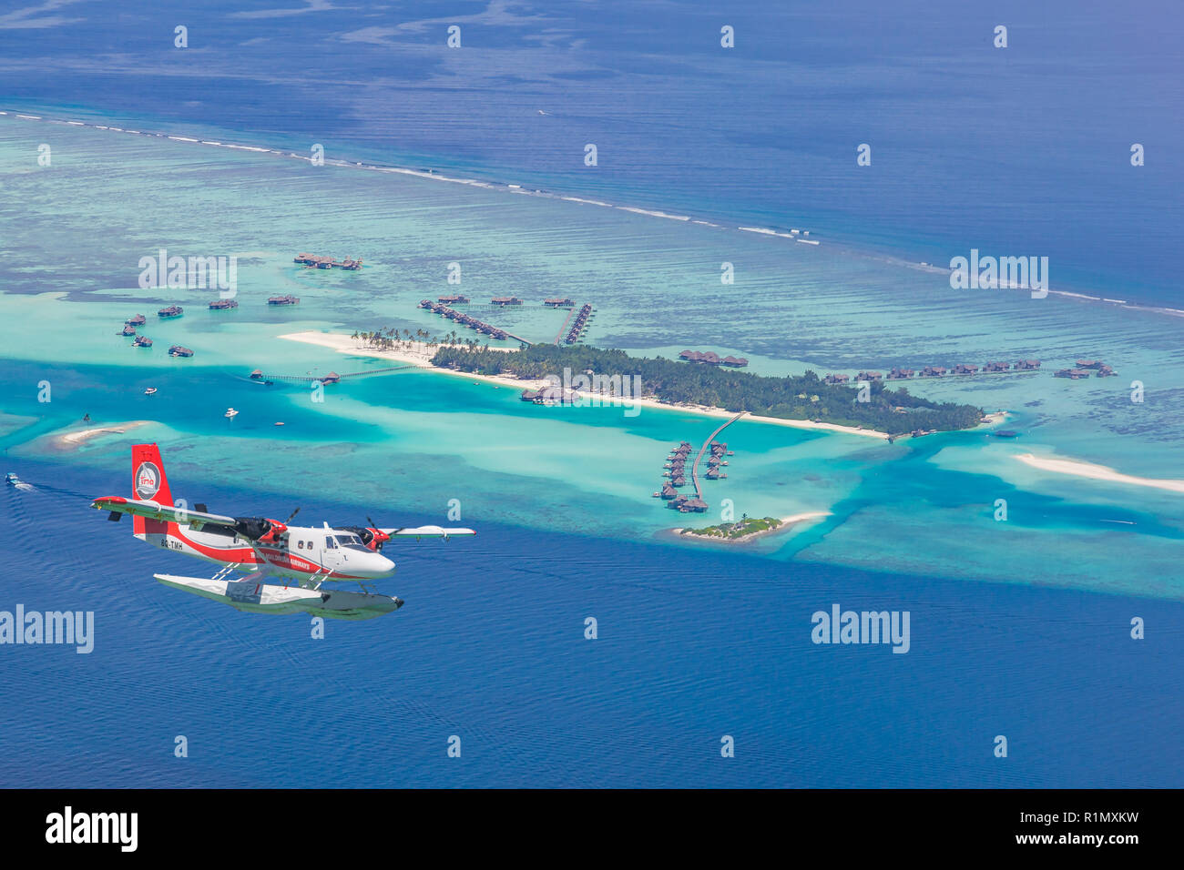 Aerial view of a seaplane approaching island in the Maldives Stock ...