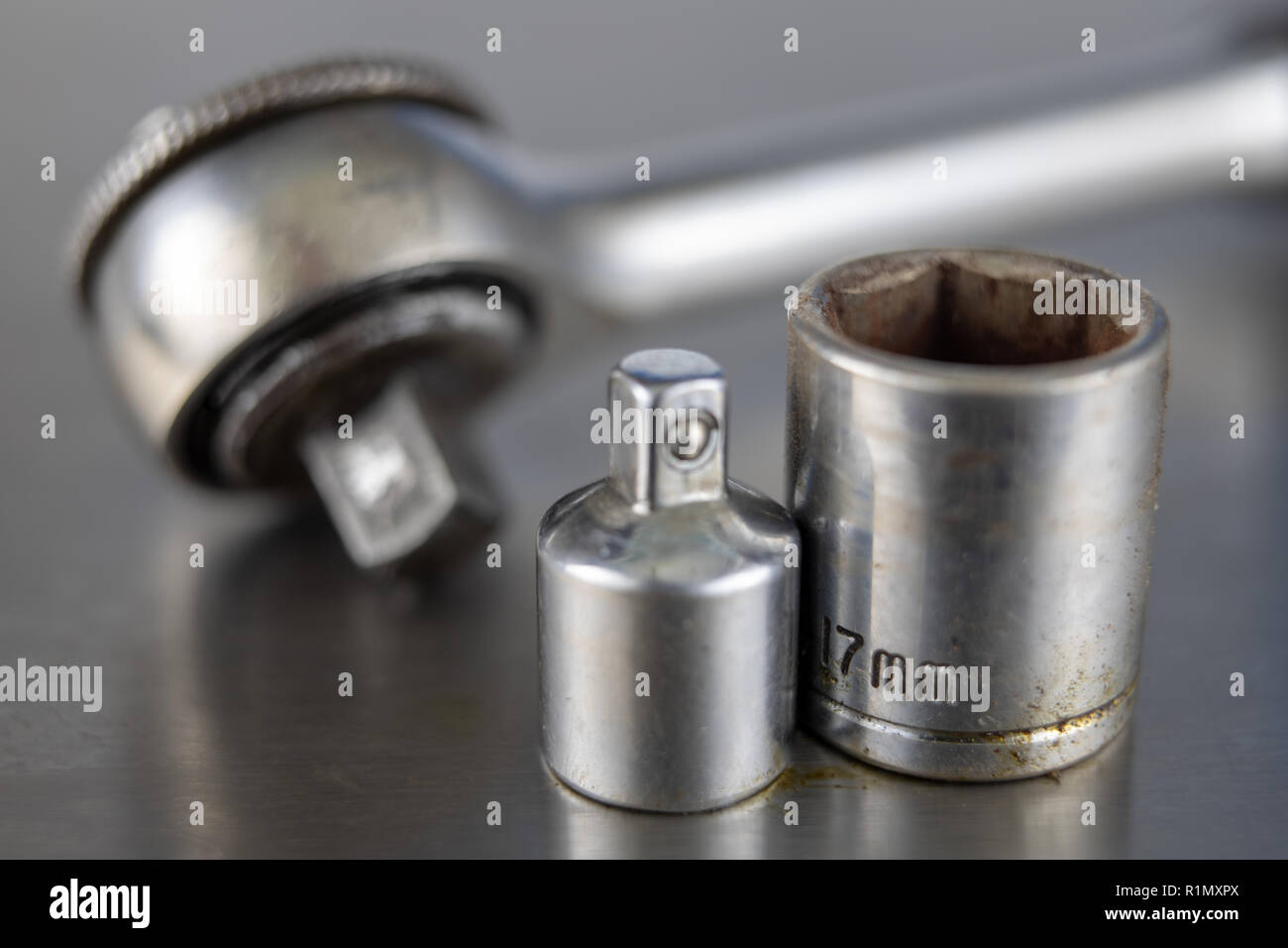 Old socket wrenches with a handle. Accessories for a workshop mechanic ...