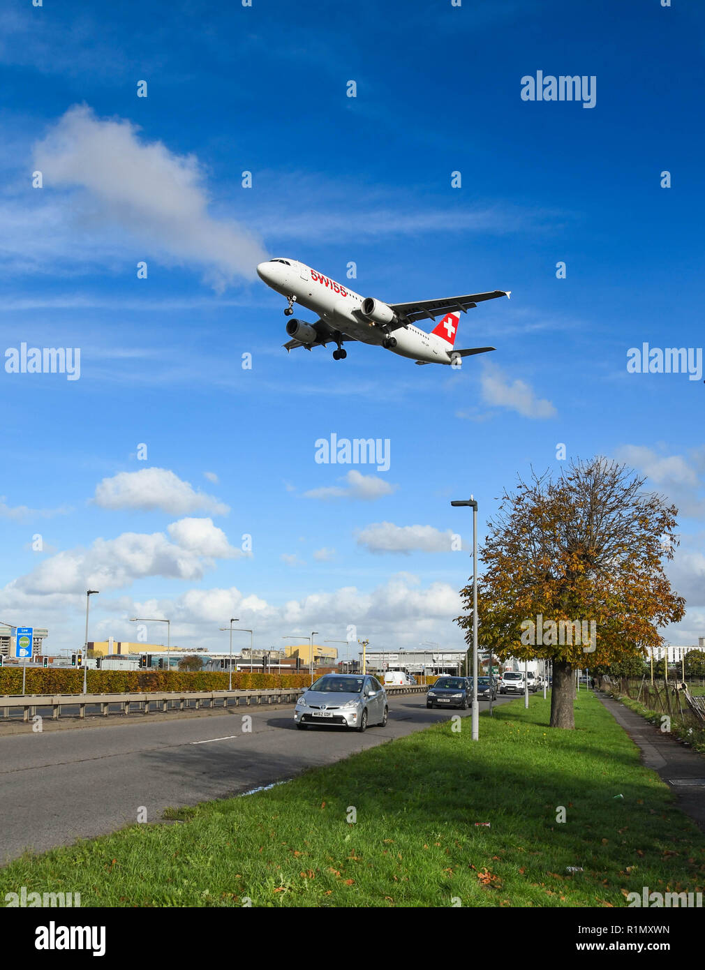 Plane over road hi-res stock photography and images - Alamy
