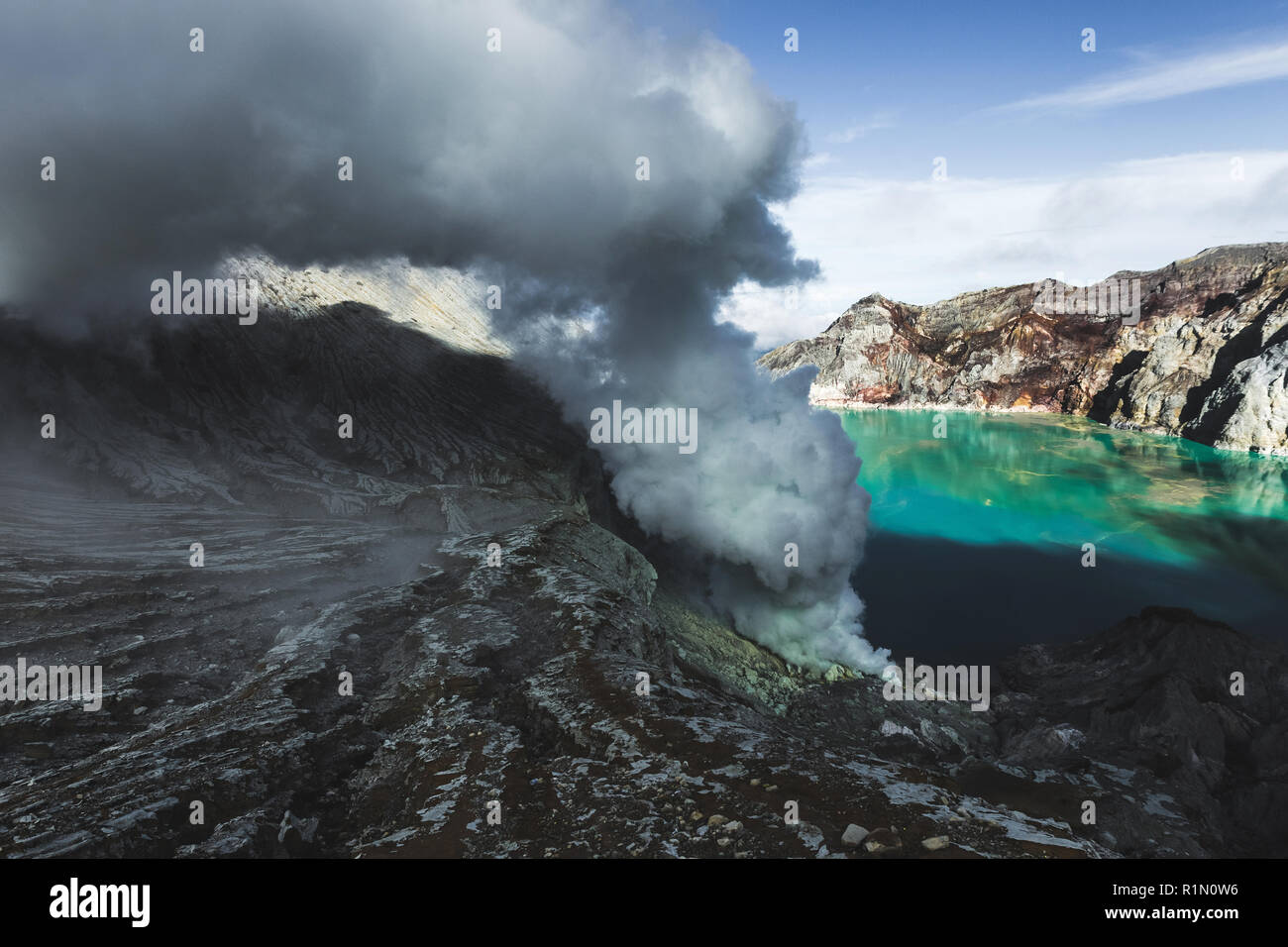 Dangerous trip Inside Ijen volcano crater Stock Photo - Alamy