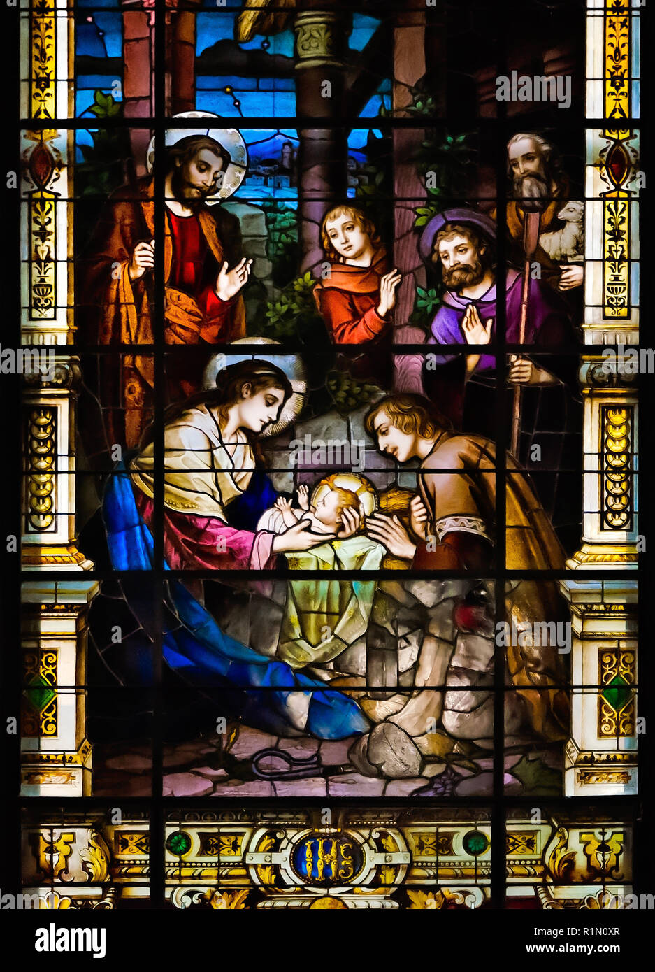 A stained glass window depicting the nativity is pictured at the ...