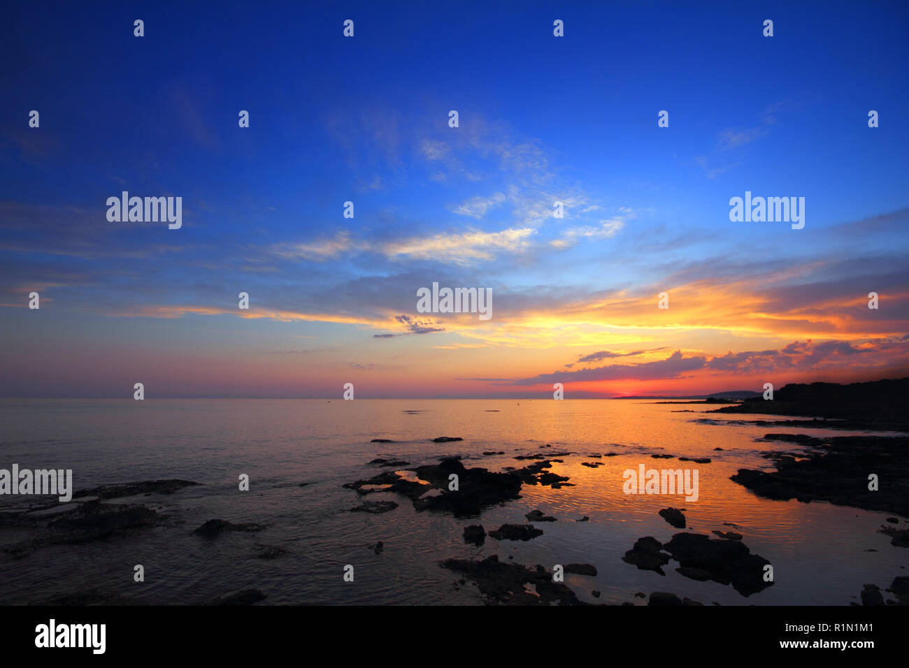 Ocean water after sunset sky hi-res stock photography and images - Alamy