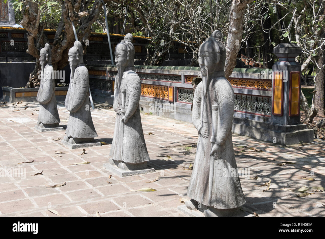 Emperors statues in courtyard Emperor Tu Duc's temple and tomb complex ...