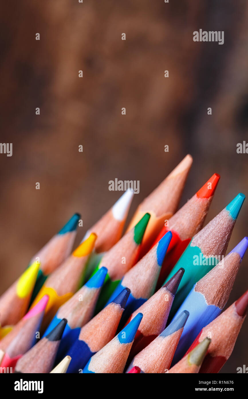 Bright color palette of crayons on the table Stock Photo - Alamy