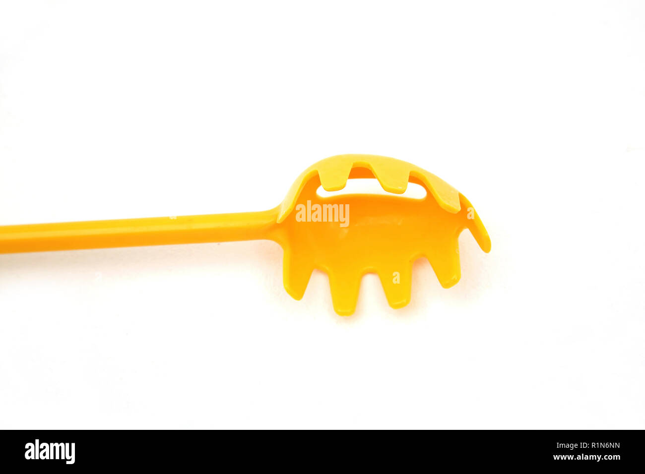 Yellow Spaghetti Ladle Stock Photo - Alamy