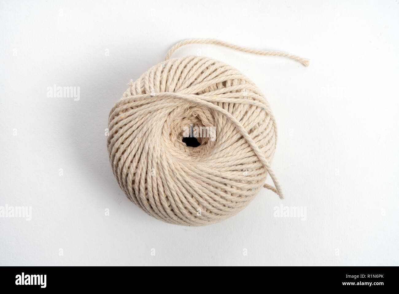 Ball of string,wound, coiled isolated on white Stock Photo - Alamy
