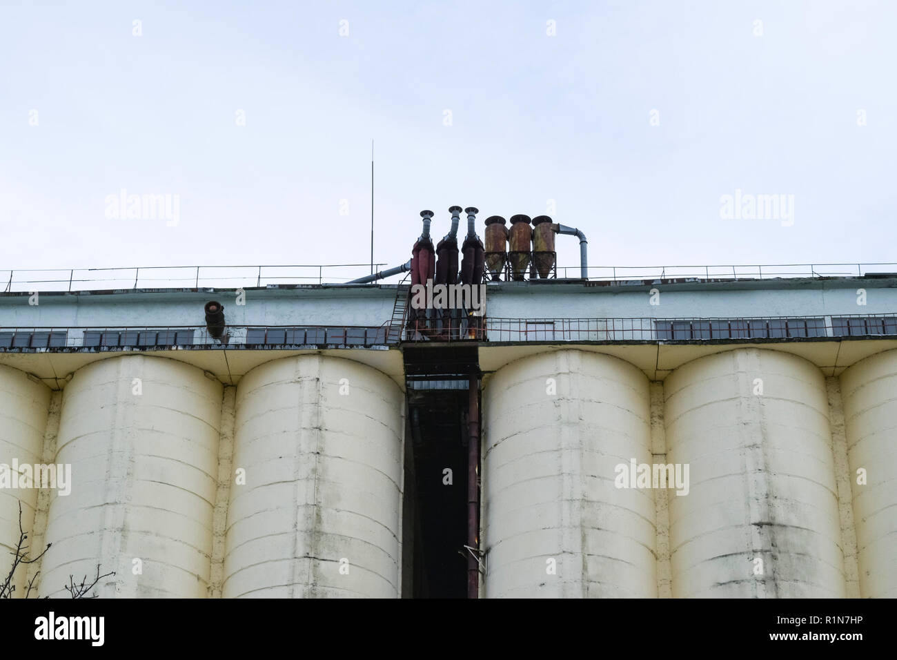 Building for storing and drying grain. Soviet-built elevator Stock ...