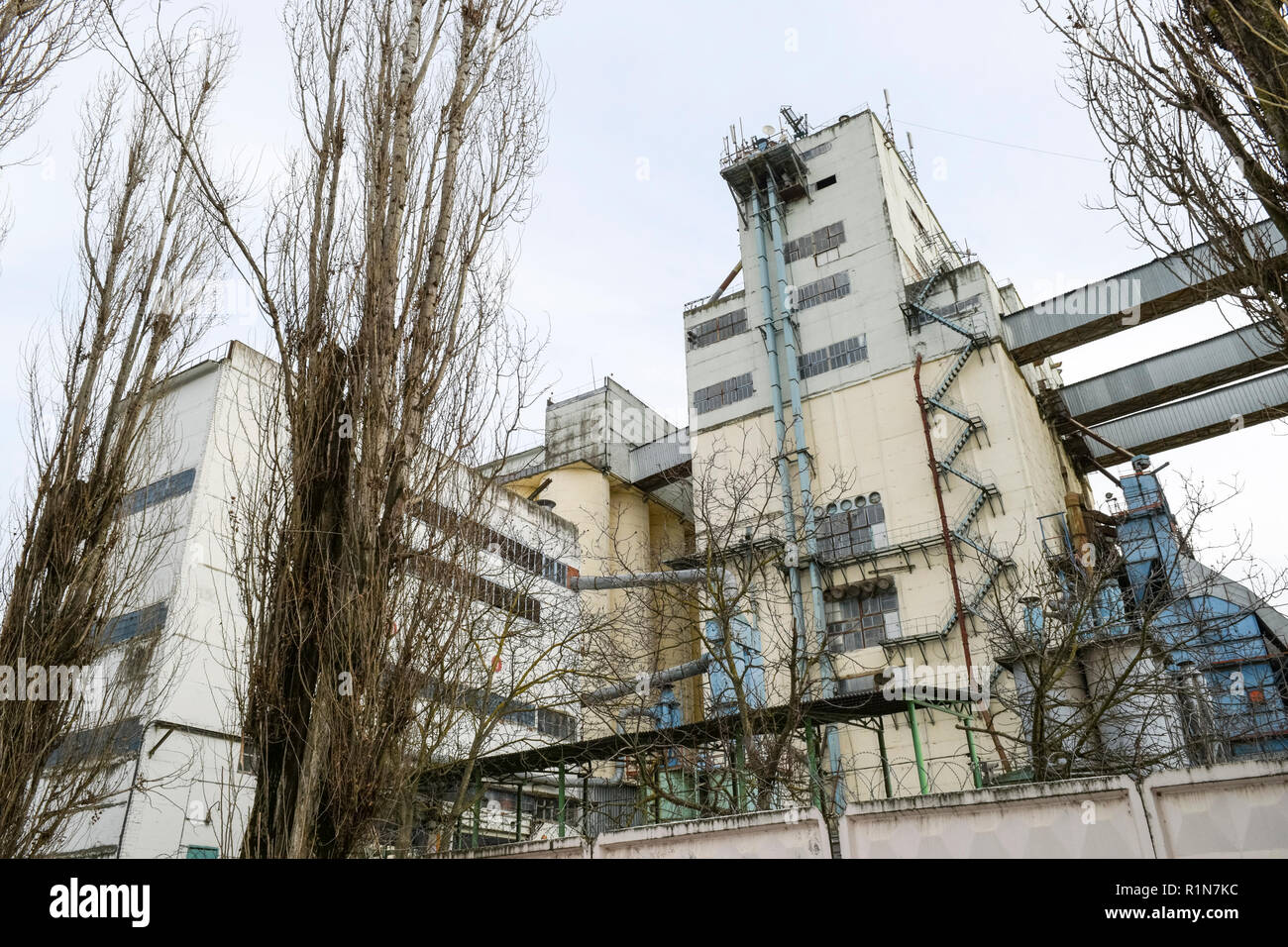 Building for storing and drying grain. Soviet-built elevator Stock ...