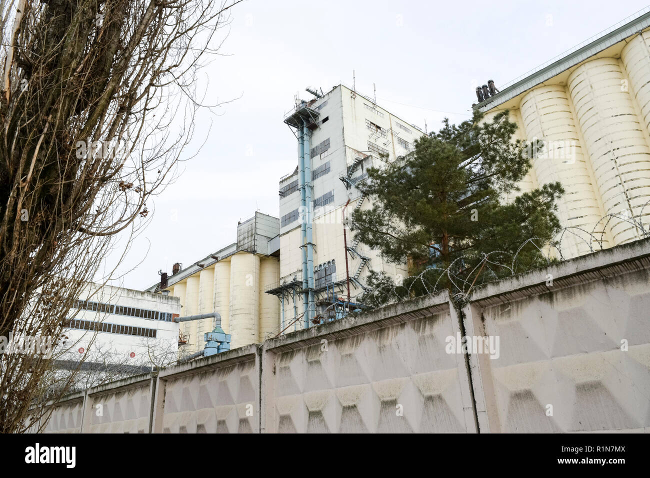 Building for storing and drying grain. Soviet-built elevator Stock ...