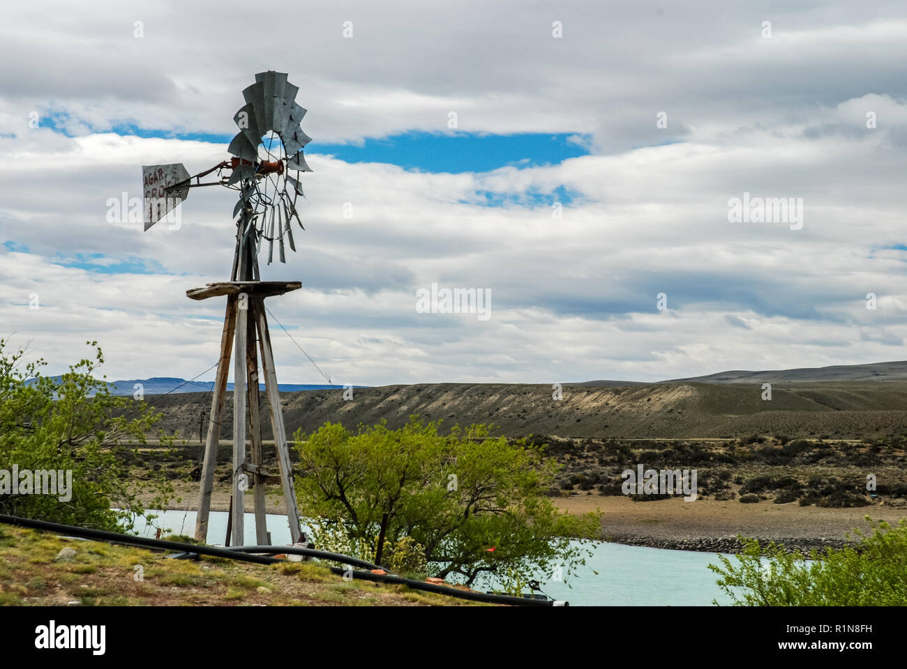 Old wind pump in a Patagonian farm Stock Photo - Alamy