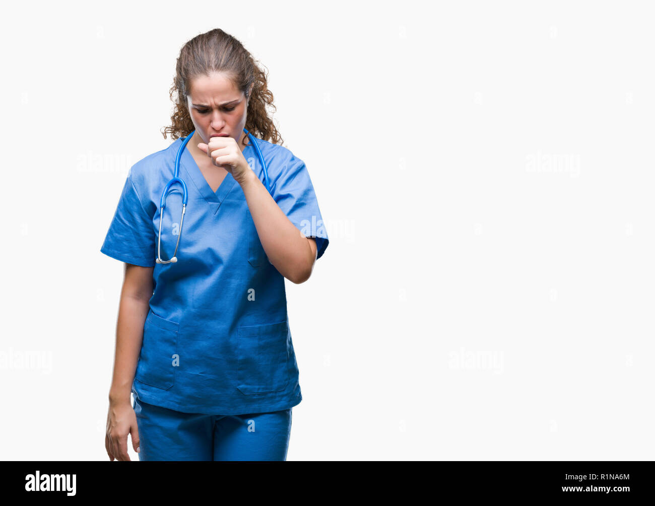 Young brunette doctor girl wearing nurse or surgeon uniform over ...