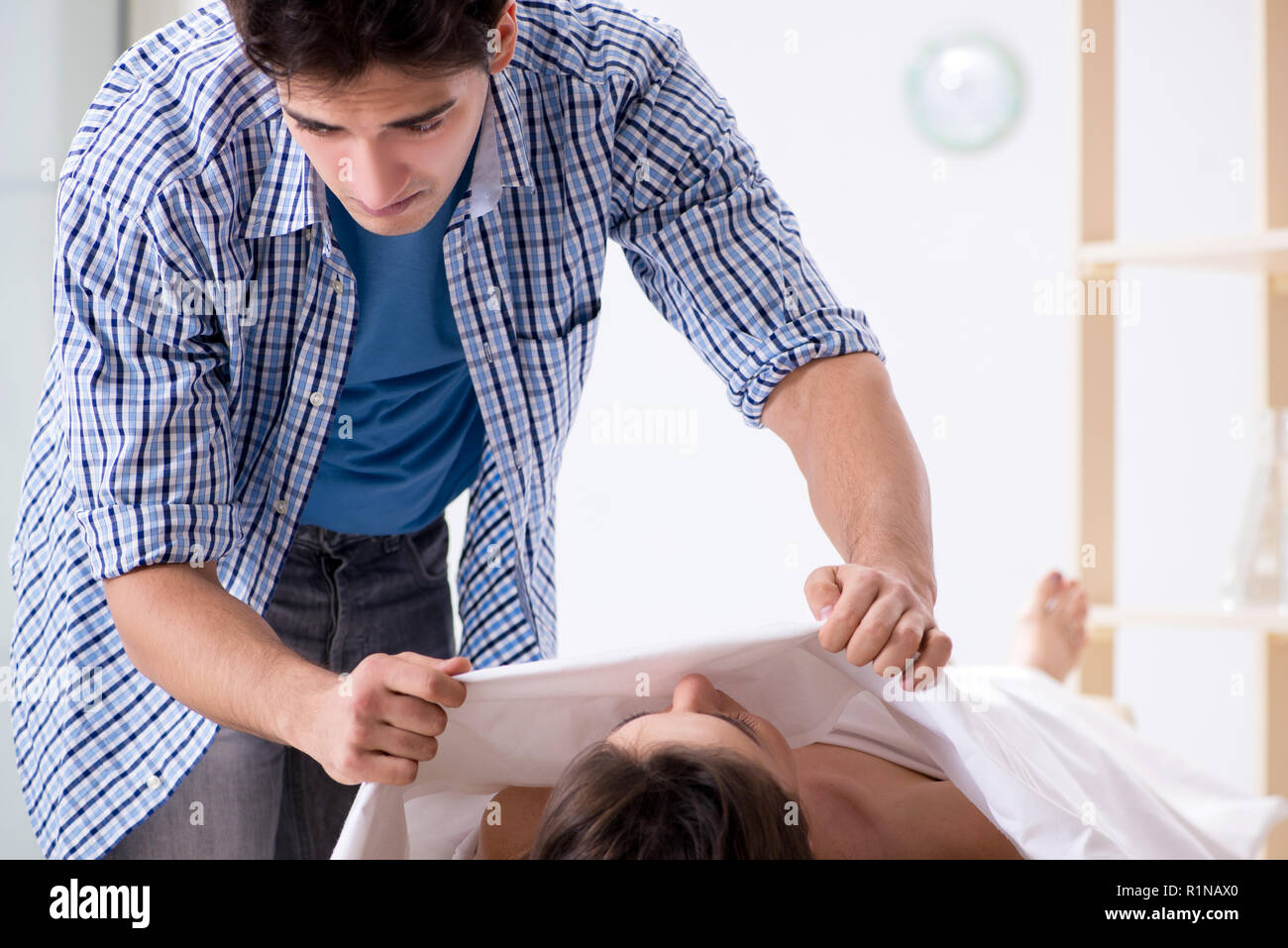 Man mourning his dead wife Stock Photo - Alamy