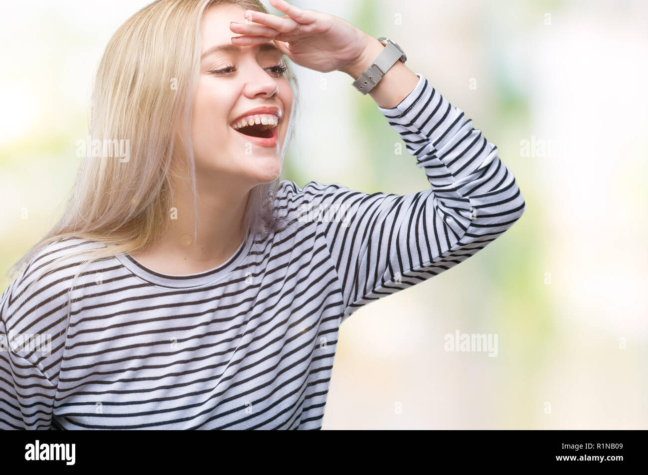 Young blonde woman over isolated background very happy and smiling ...