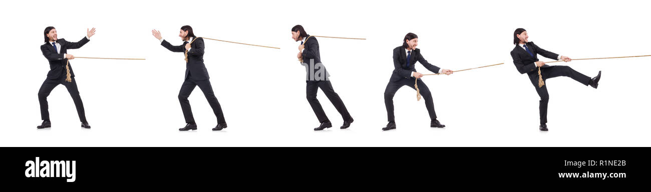 Young businessman pulling rope isolated on white Stock Photo - Alamy