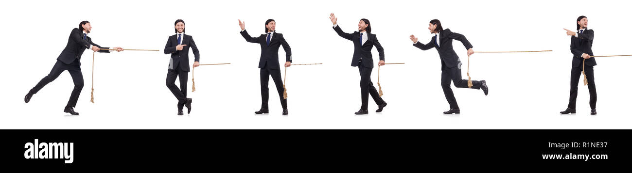 Young businessman pulling rope isolated on white Stock Photo - Alamy