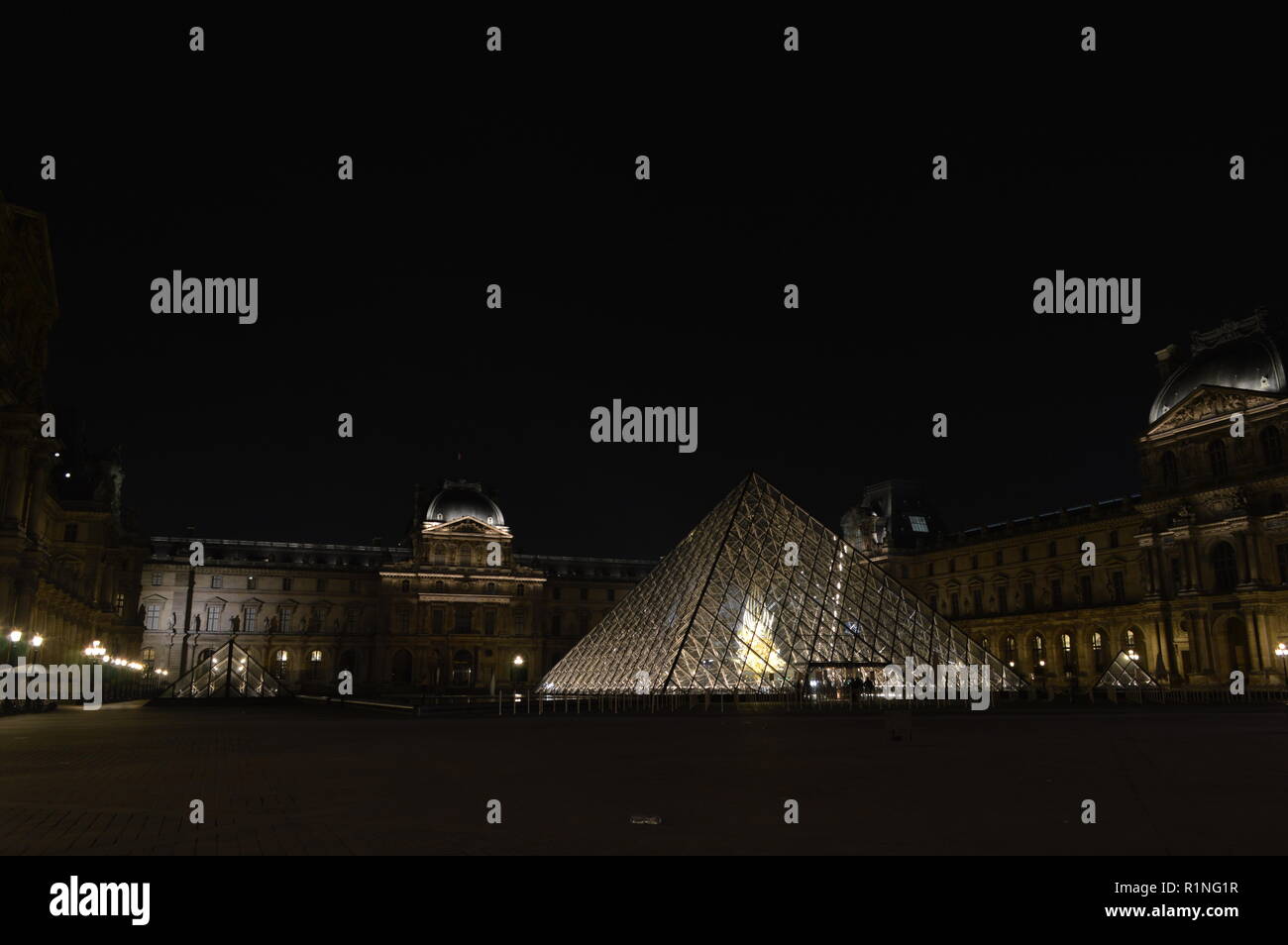 Louvre pyramid paris long exposure hi-res stock photography and images ...
