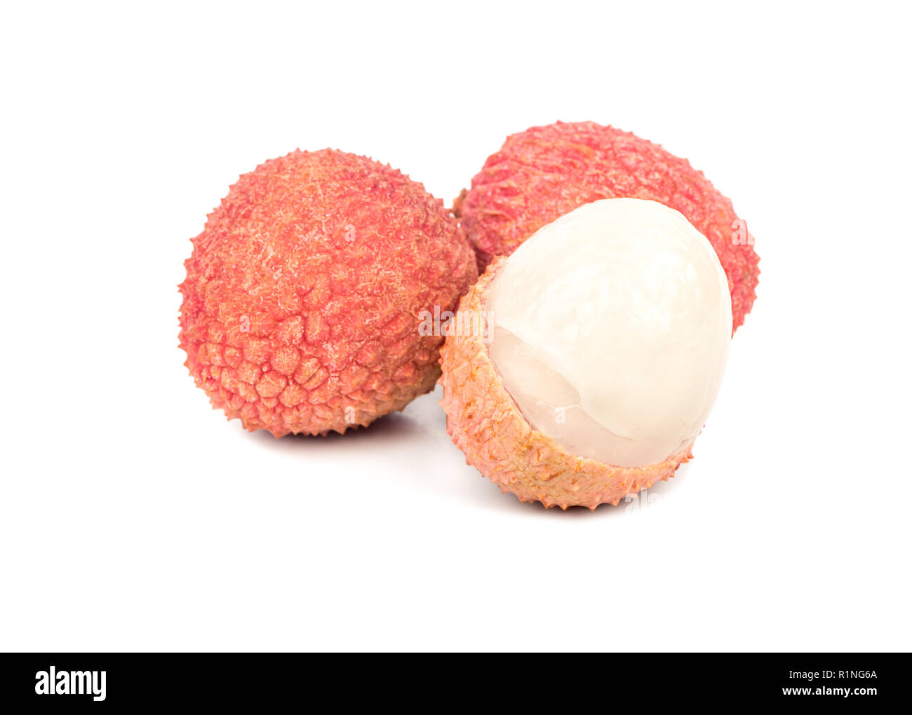 Three chinese lychee fruit on white background Stock Photo - Alamy