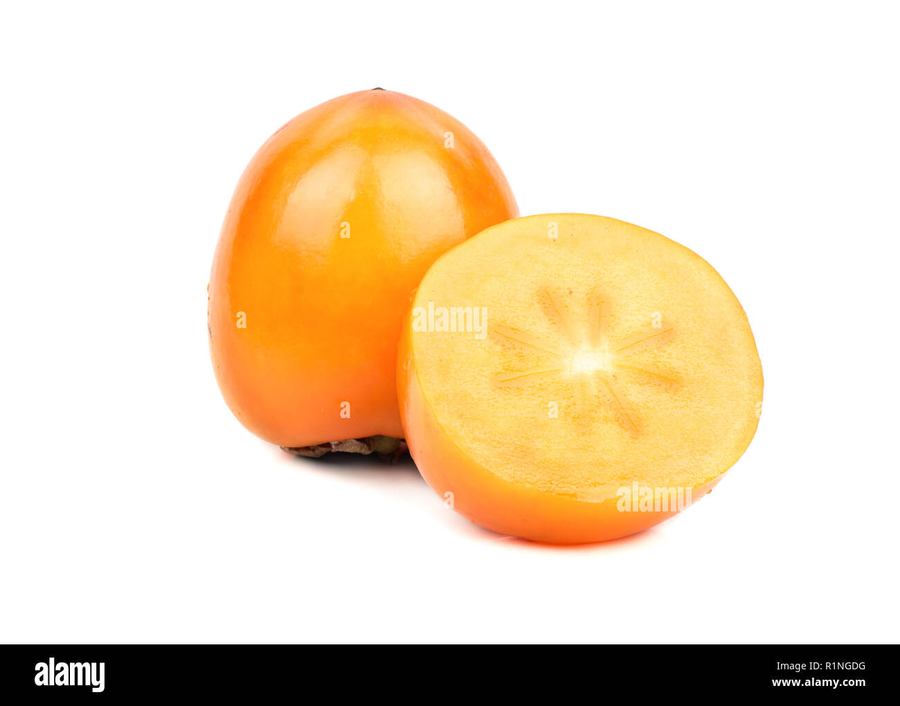 Fresh persimmon fruit with half isolated on white background Stock ...