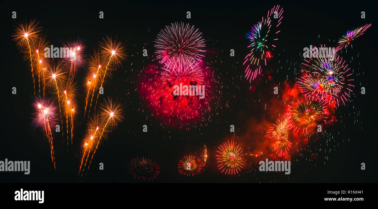 Colorful fireworks explosion on the black background Stock Photo - Alamy
