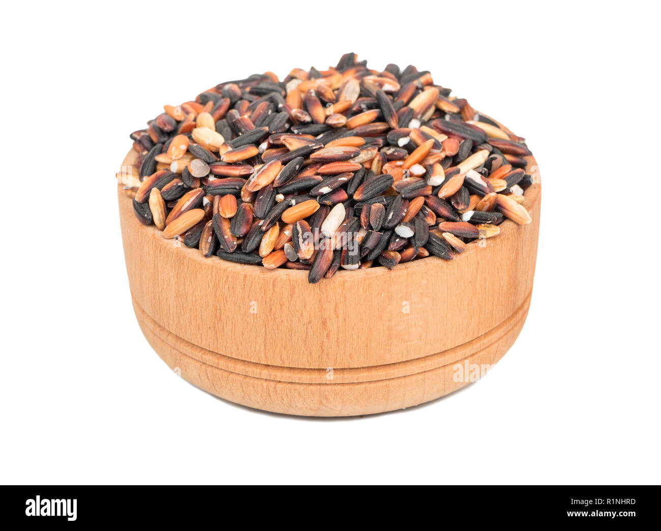 Black wild rice in wooden bowl isolated on white background Stock Photo ...