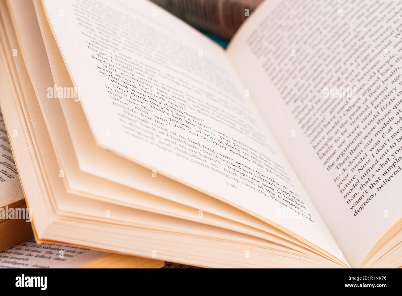 Opened books close up picture Stock Photo - Alamy