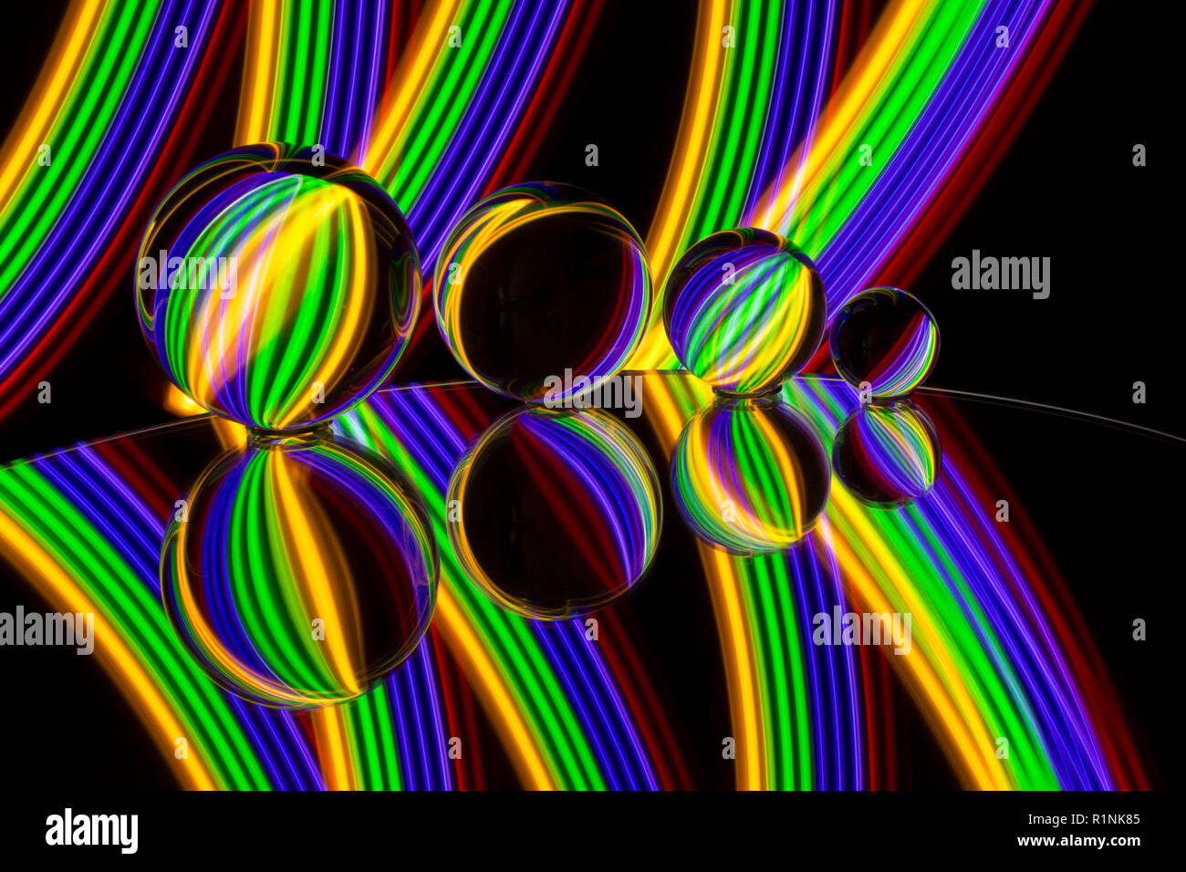 Light painting with four Lensball / crystal / glass ball Stock Photo ...