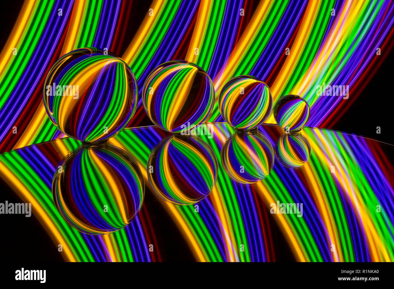 Light painting with four Lensball / crystal / glass ball Stock Photo ...