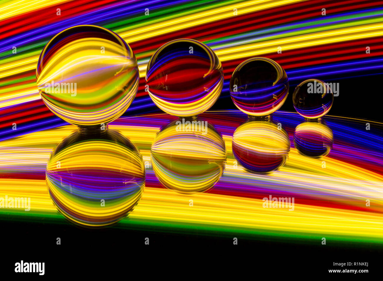 Light painting with four Lensball / crystal / glass ball Stock Photo ...